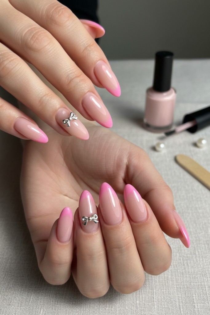 Pink French Tip Nails With Charms That Steal Every Glance!
